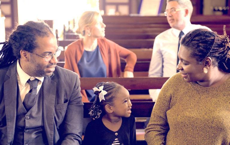 People in church family SHUTTERSTOCK